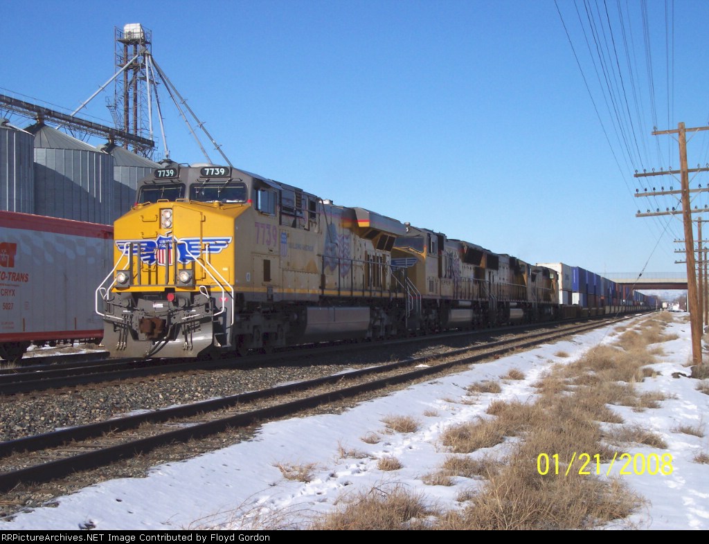 UP 7739 leads eastbound stack train
